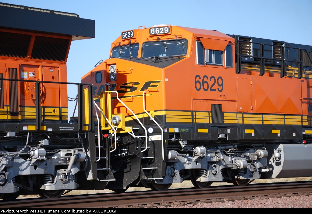 BNSF 6629 close up shot of cab as the sun reflects of her Brand New BNSF Swoosh Logo Paint Job.